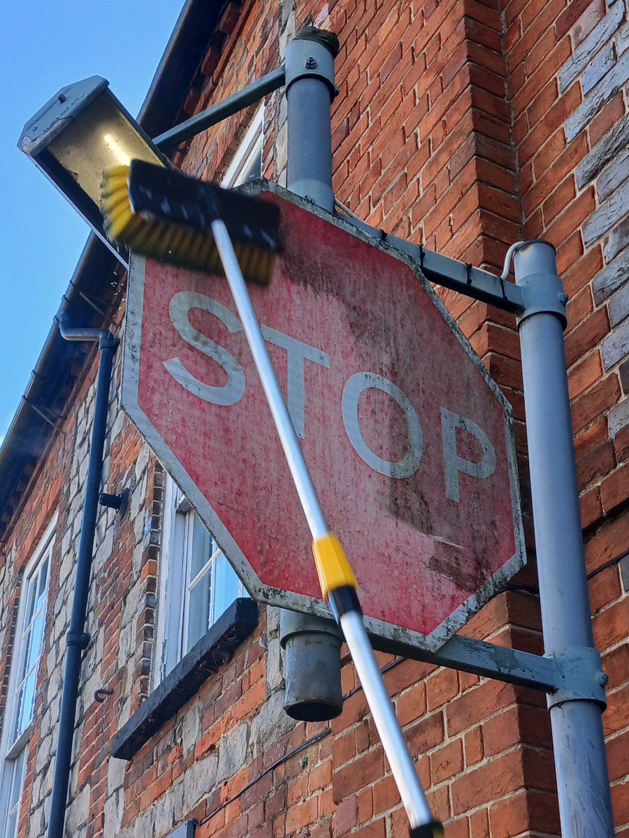 Shining a Light on Safety: The Lambourn Shed Cleans Village Road Signs ...